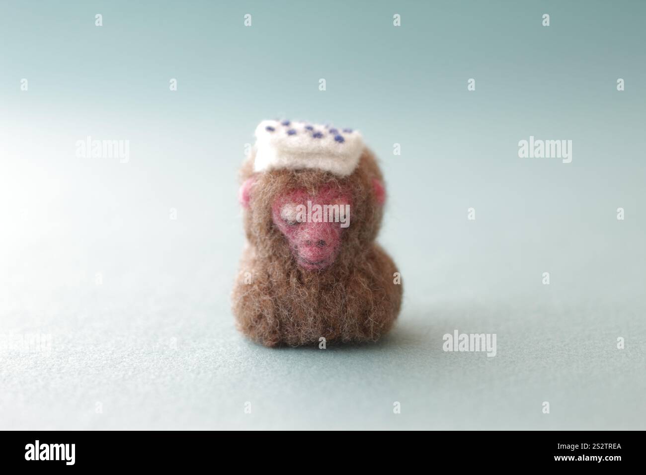 Felt Monkey And Blue Background Stock Photo - Alamy