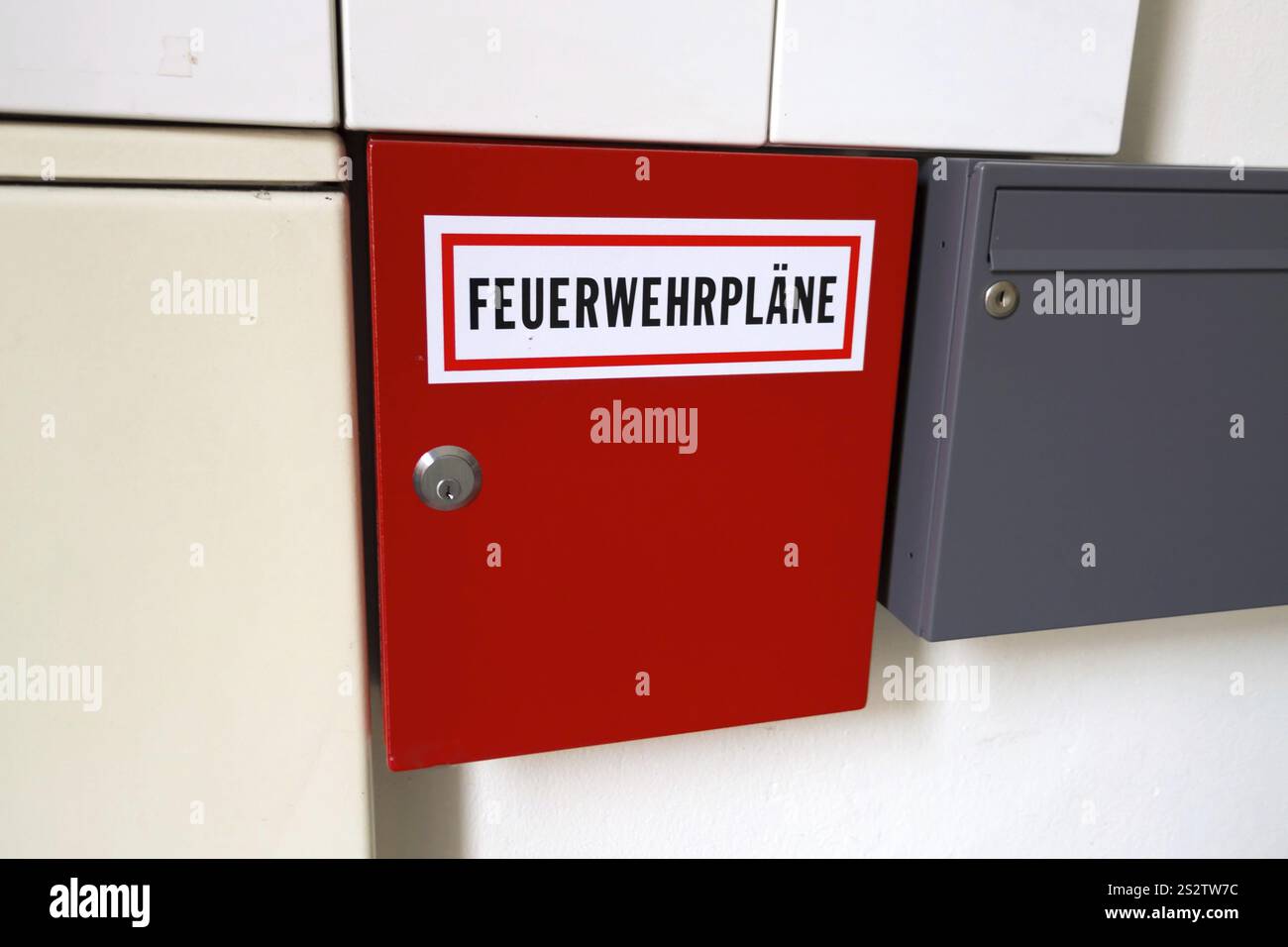 The plans for the fire brigade in an emergency are kept in a cupboard ...