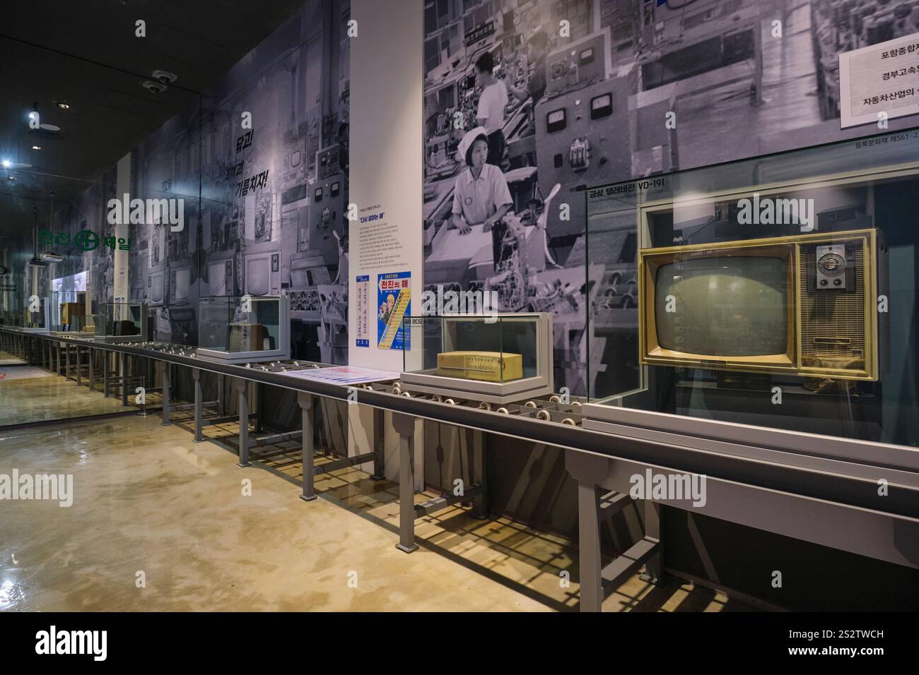 A recreation of an electronics factory making radios, televisions. At ...