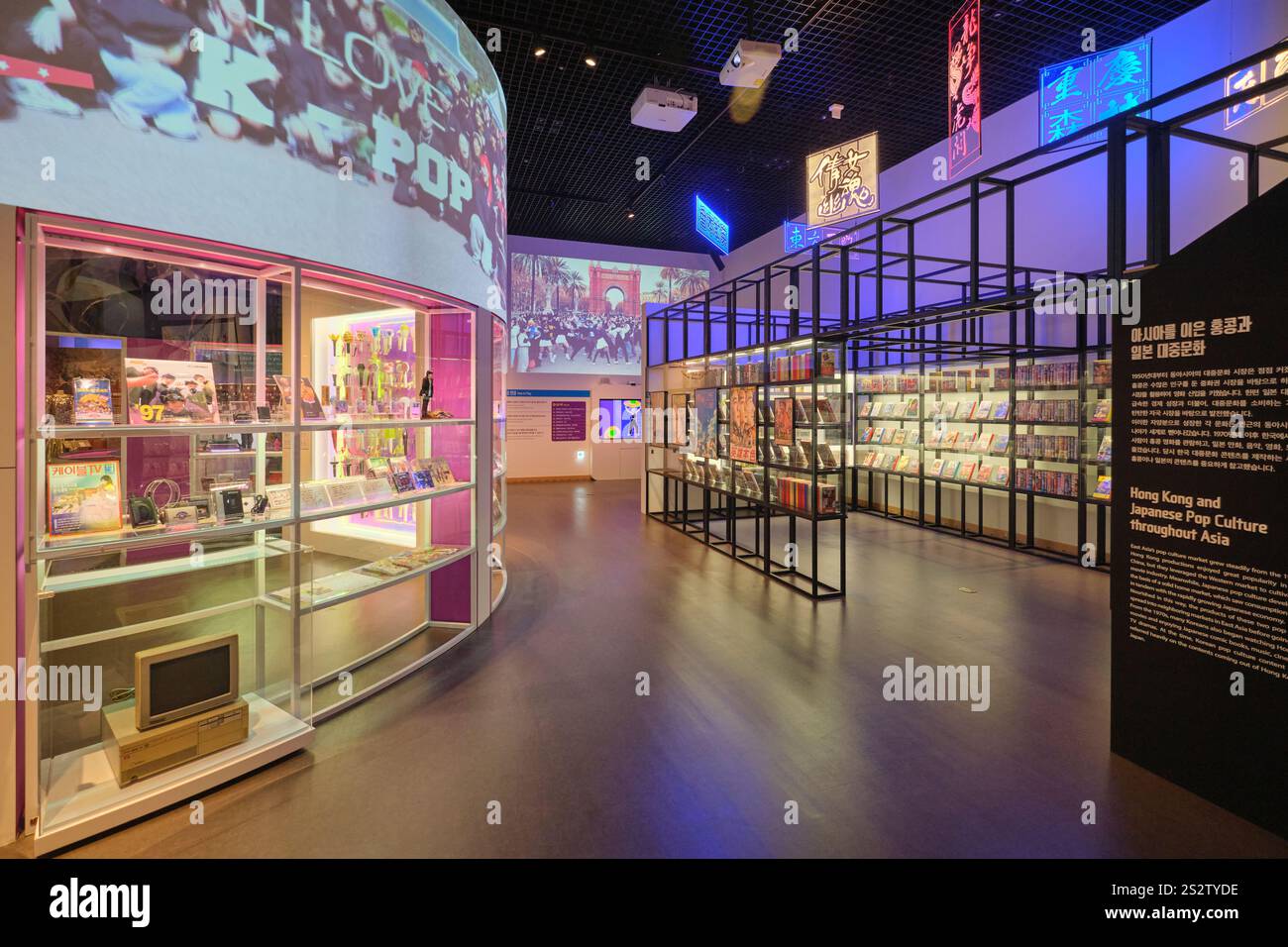 Various KPop, music, vinyl, anime items on display. In a pop culture ...