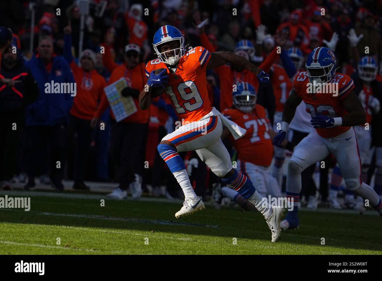 Denver Broncos wide receiver Marvin Mims Jr. (19) runs for a touchdown ...