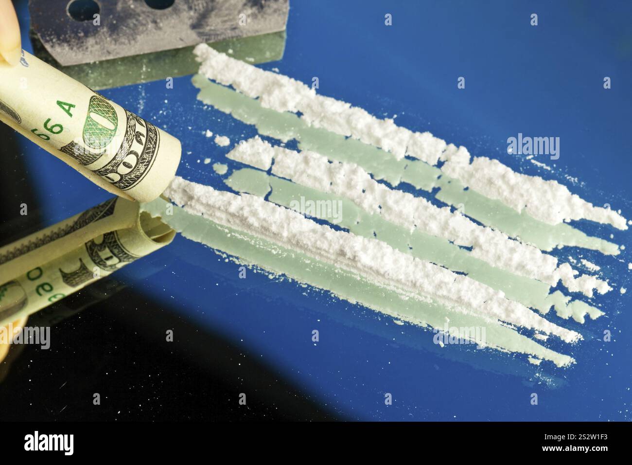 A line of cocaine was drawn. Symbolic photo for drug abuse. Austria ...