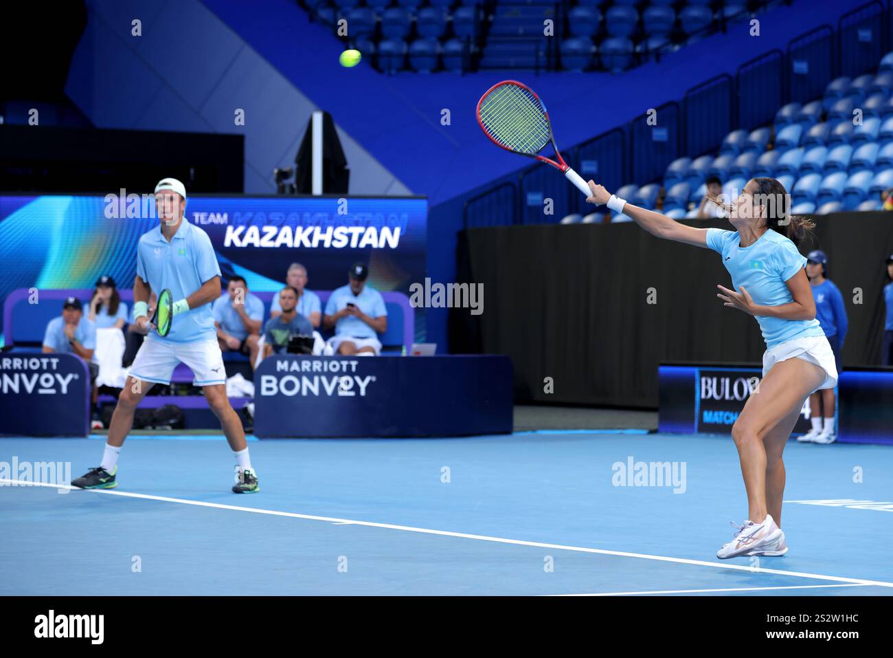 Dmitry Popko and Zhibek Kulambayeva of Kazakhstan in action against Tim ...