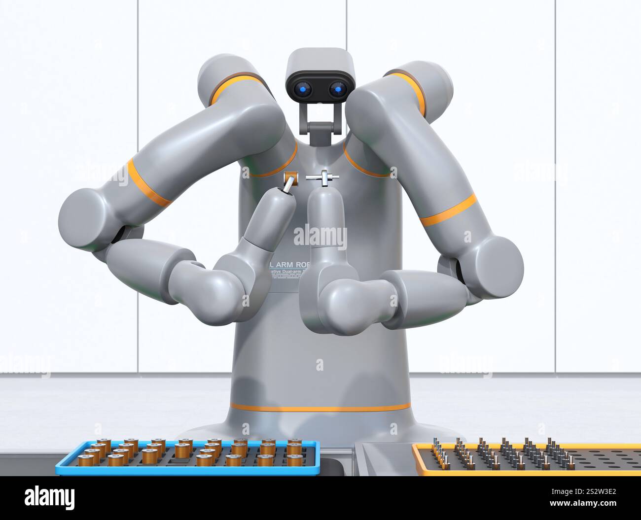 Frontal image of a twin-armed robot assembling motor coils. Cooperative ...
