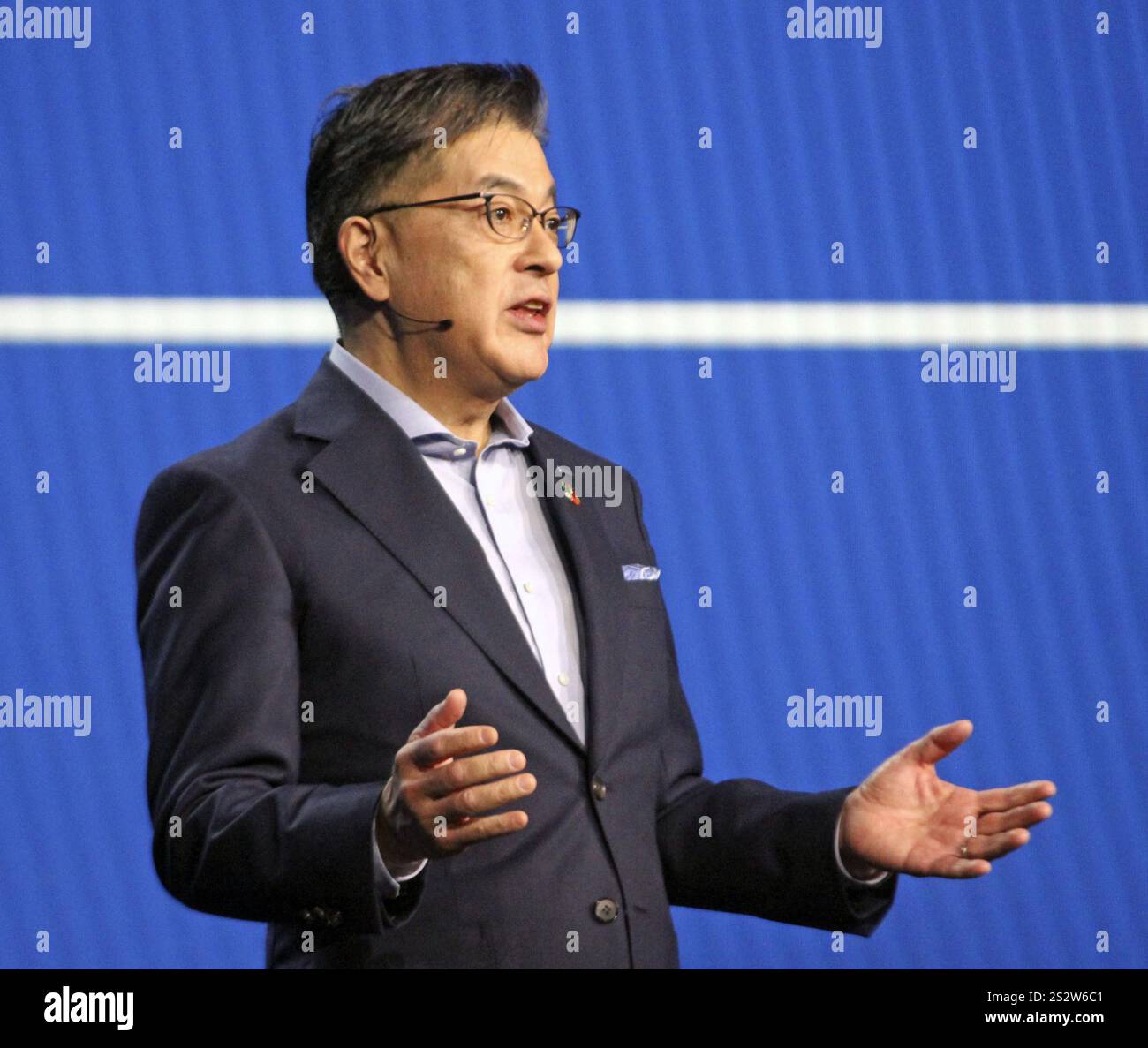 Panasonic Holdings Corp. President Yuki Kusumi makes a keynote speech ...