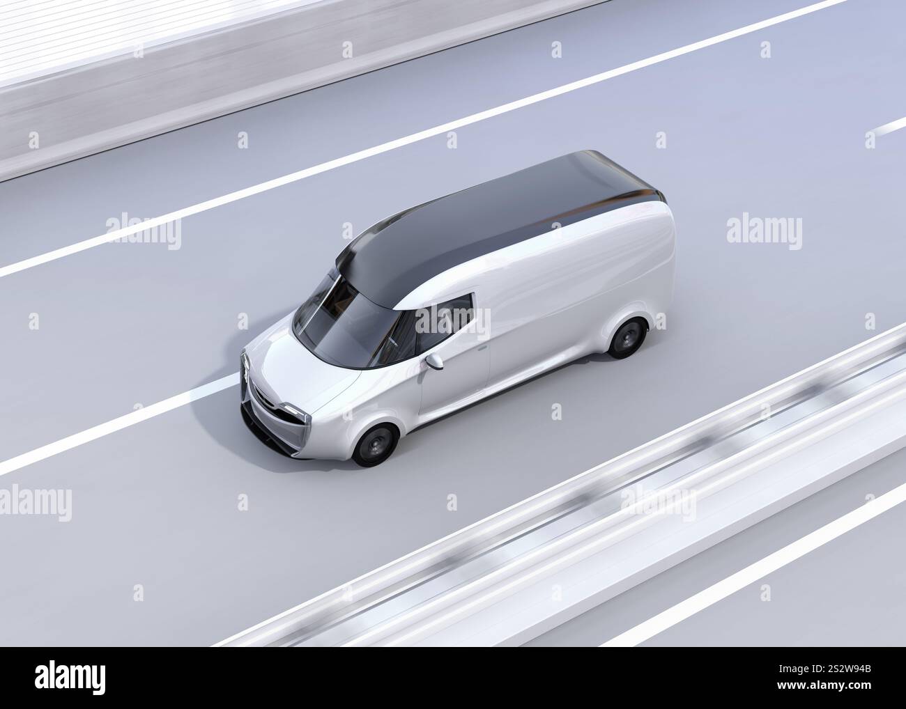 White automatic electric delivery vehicle travelling on a motorway ...