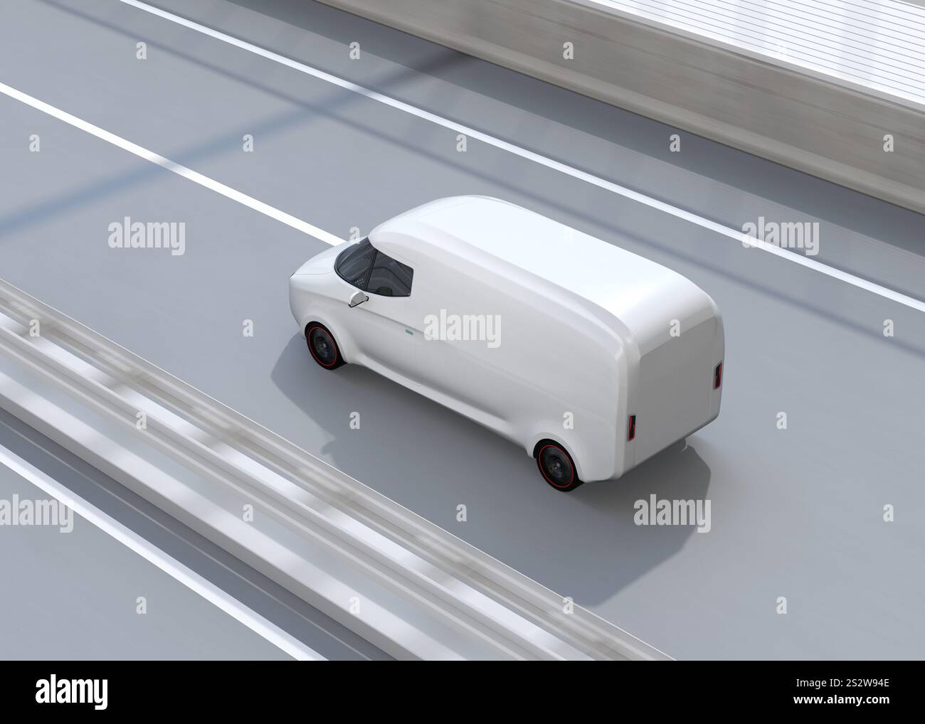 White automatic electric delivery vehicle travelling on a motorway ...