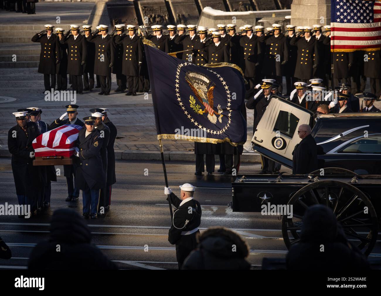 A Joint Service Casket Team transfers the casket of former President ...