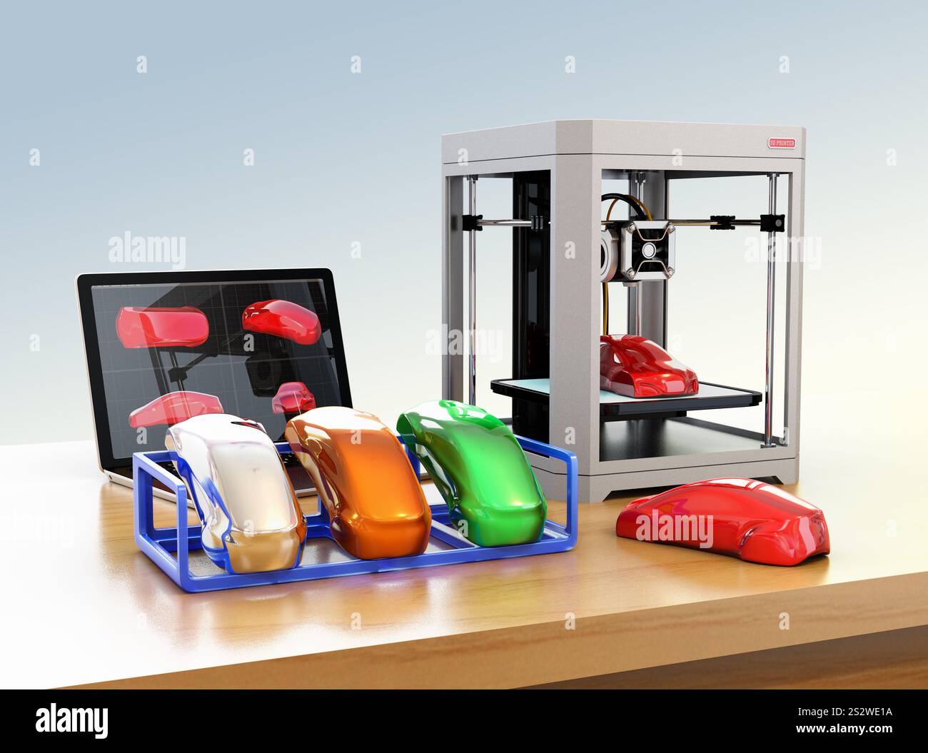 Notebook computer, 3D printer and images of output samples with ...