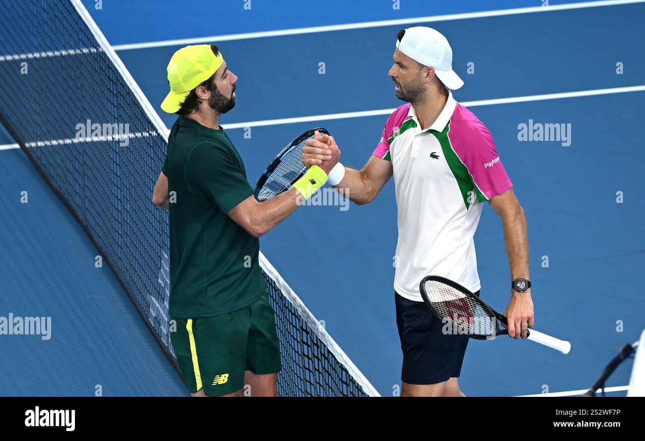 Brisbane, Australia. 03rd Jan, 2025. An injured Jordan Thompson (left ...