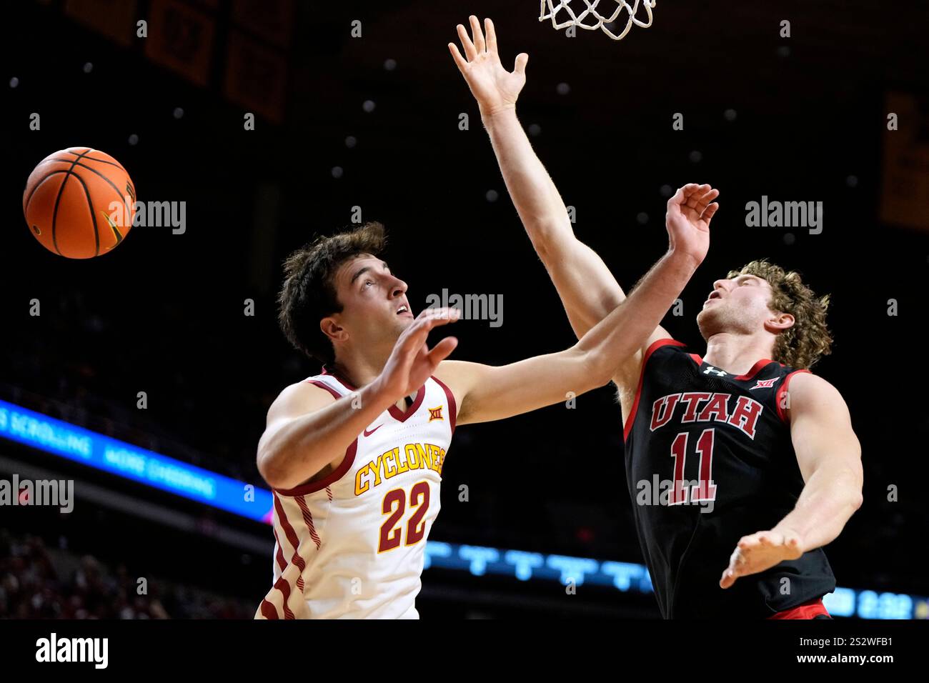 Iowa State forward Milan Momcilovic (22) fights for a rebound with Utah ...