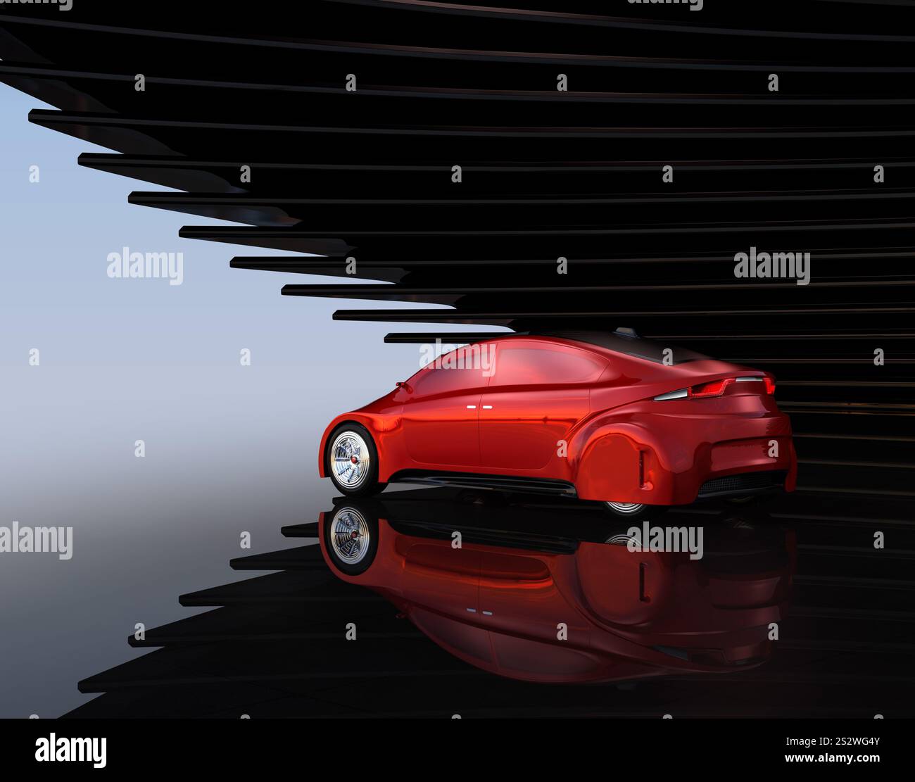 Red electric car parked in front of black background Stock Photo - Alamy