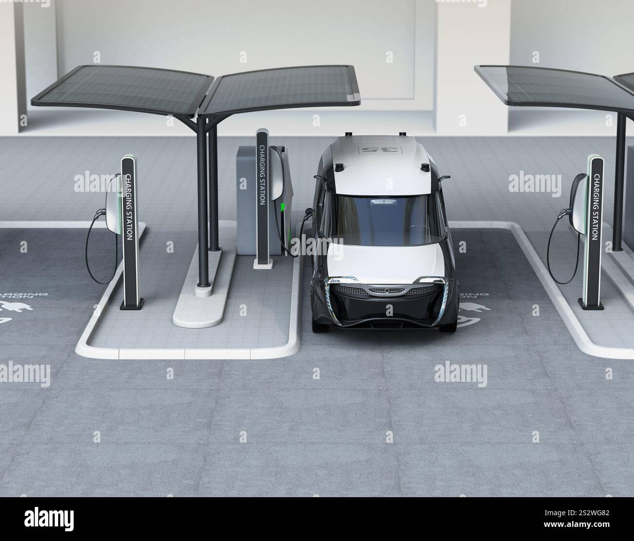 Image of an electric car charging at a charging station Stock Photo - Alamy