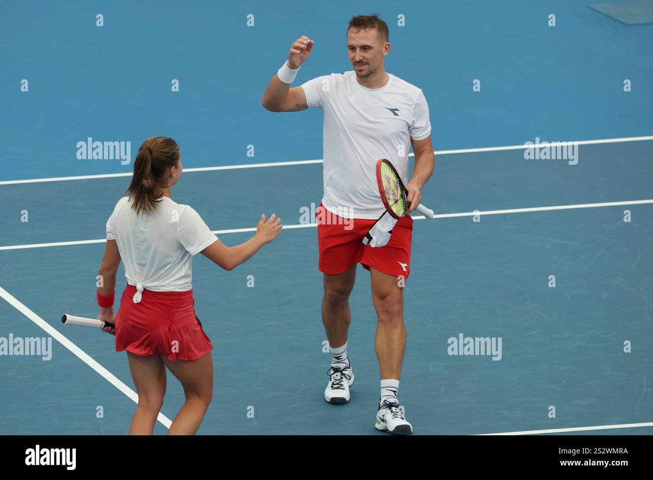 Sydney, Australia. 04th Jan, 2025. Maja Chwalinska of Team Poland and Jan Zielinski of Team ...