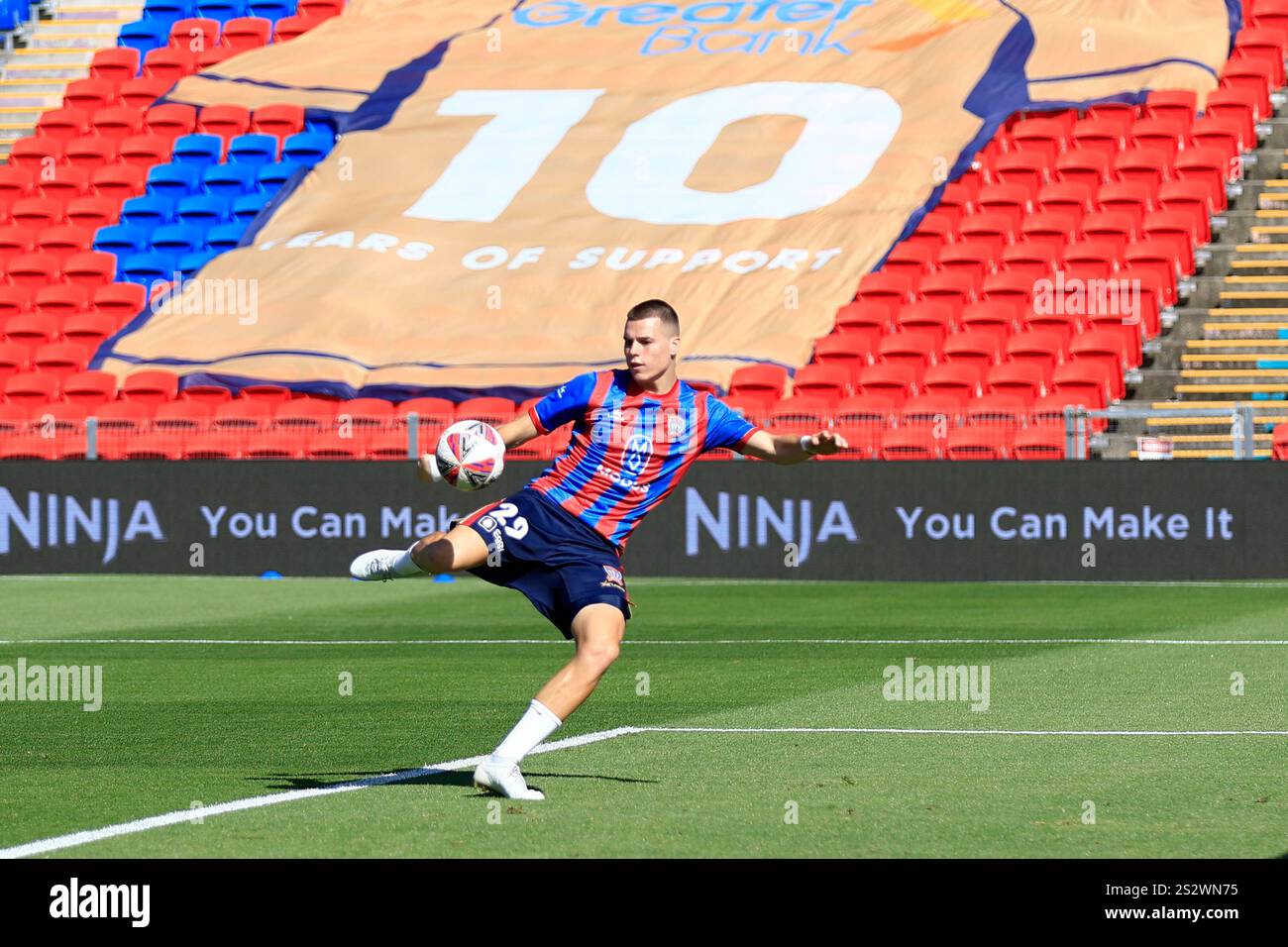 Newcastle, Australia. 04th Jan, 2025. Justin Vidic of The Jets warms up ...
