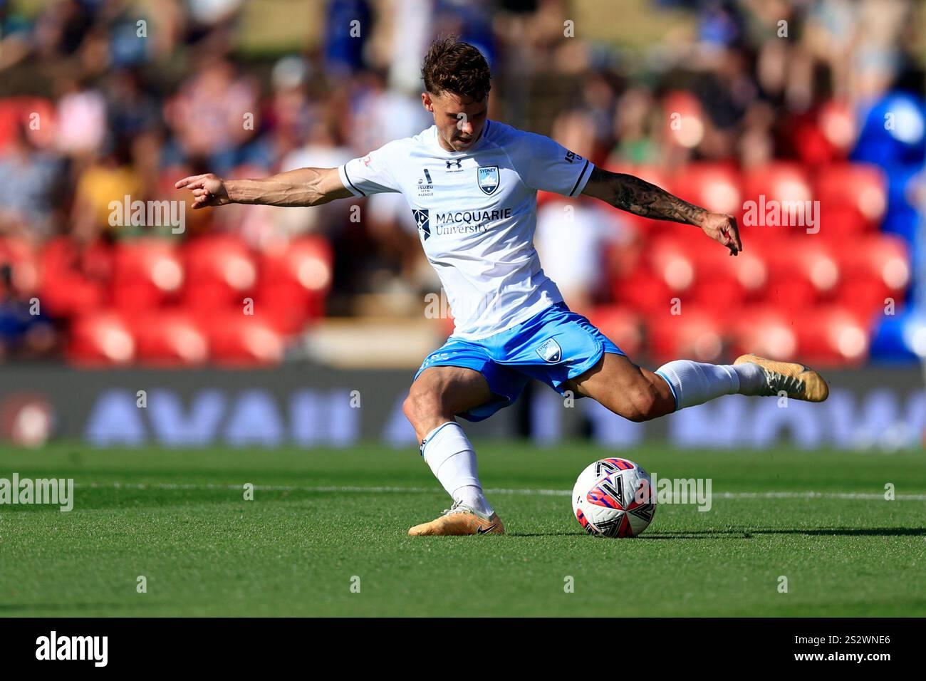 Newcastle, Australia. 04th Jan, 2025. Joe Lacy of Sydney FC kicks the ...