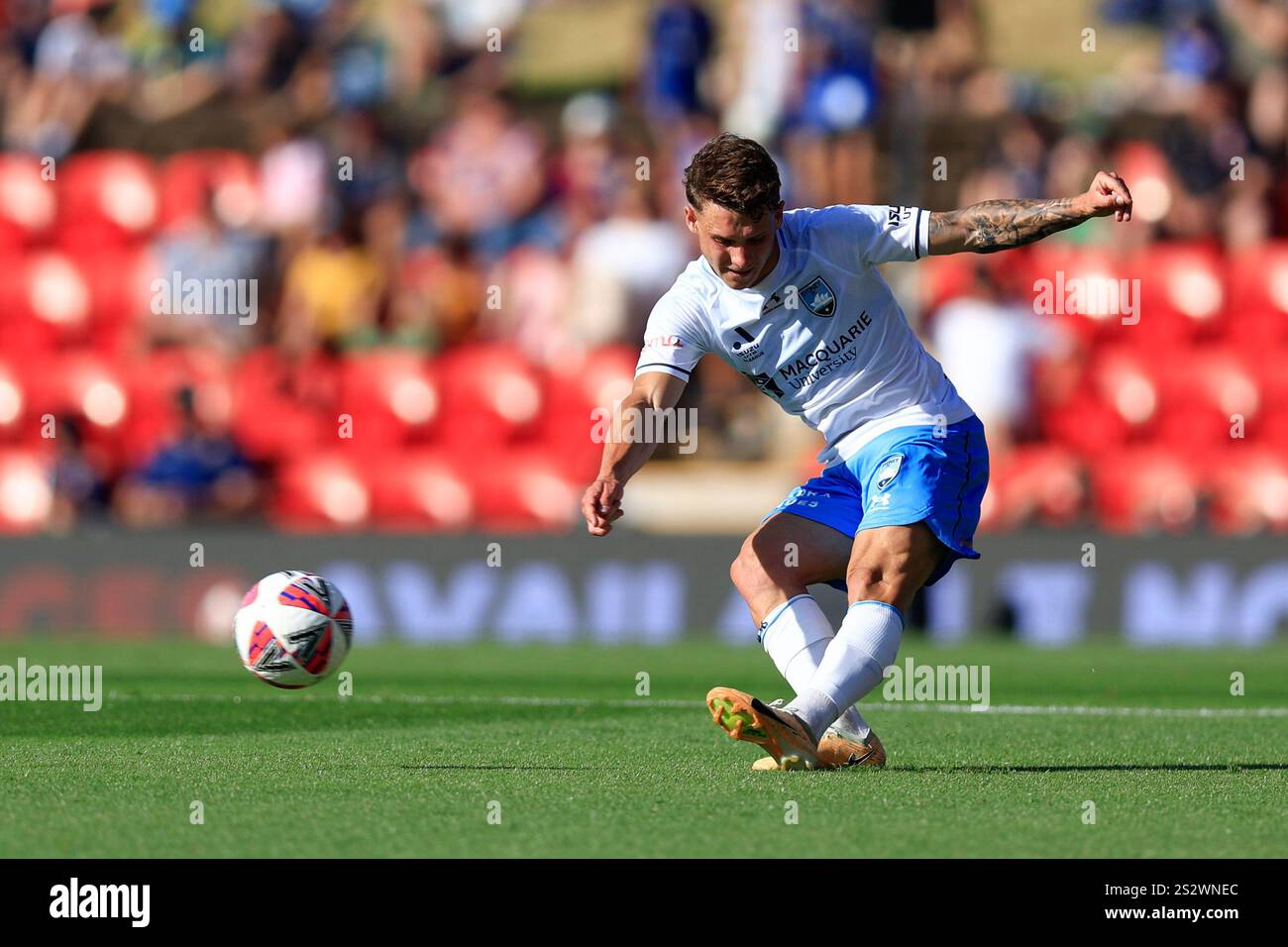 Newcastle, Australia. 04th Jan, 2025. Joe Lacy of Sydney FC kicks the ...