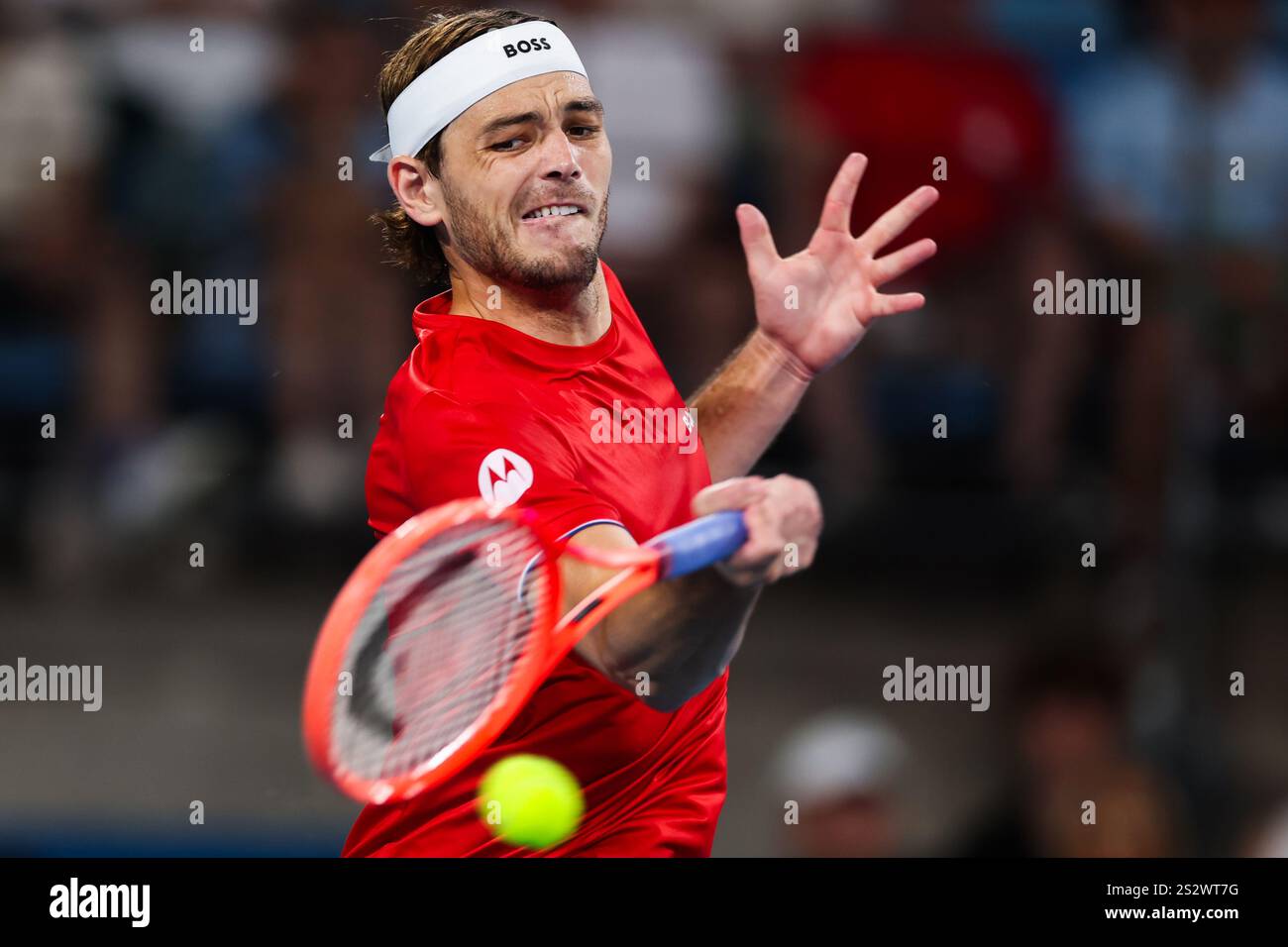 Taylor Fritz of Team USA plays a forehand in the men's singles finals ...