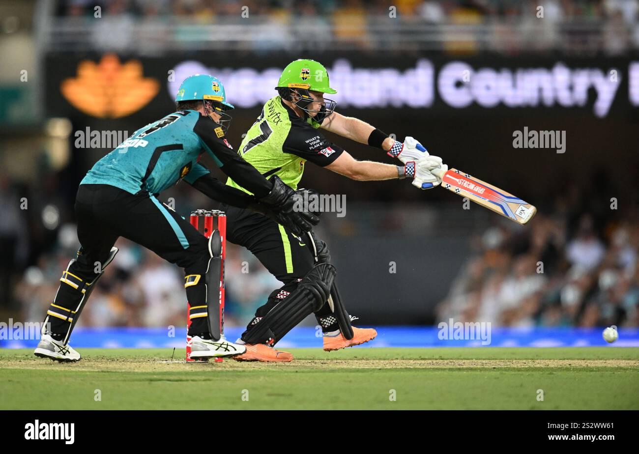 Sam Billings (right) of the Thunder in action during the Big Bash ...