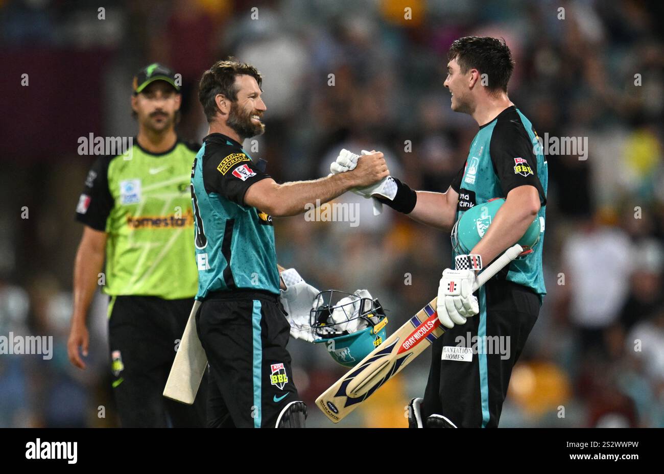 Michael Nesser (left) and Matthew Renshaw (right) of the Heat celebrate ...