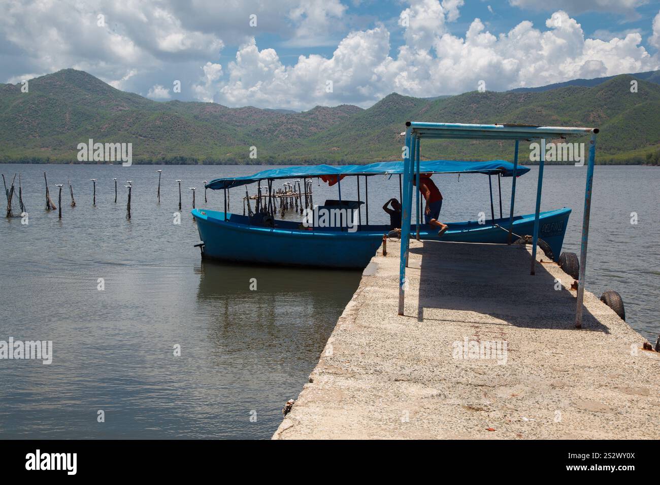 A Small boat in Laguna de Baconao, Santiago de cuba Stock Photo - Alamy