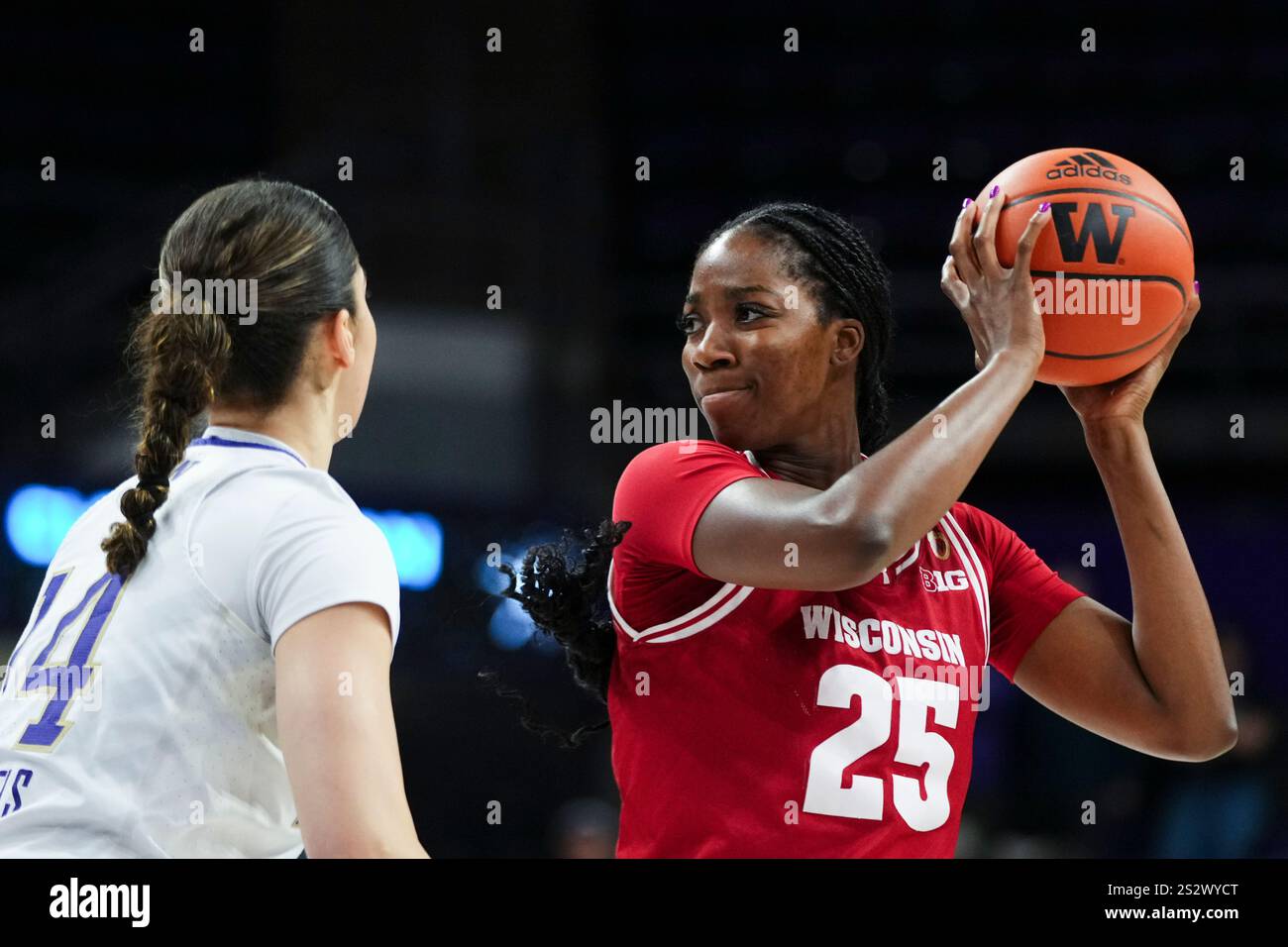 Wisconsin forward Serah Williams (25) looks to move around the defense ...