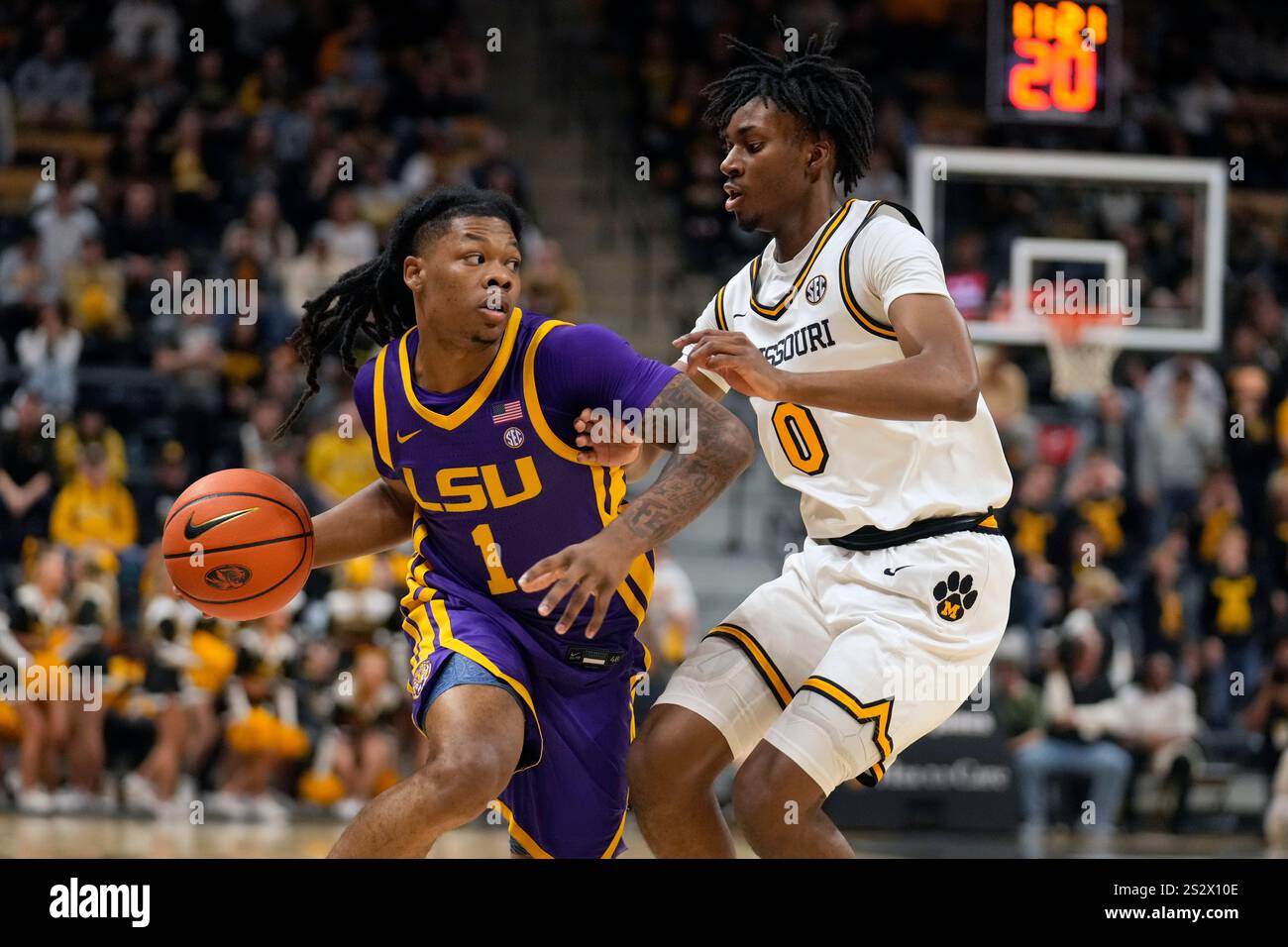 LSU's Jordan Sears (1) heads to the basket as Missouri's Anthony ...