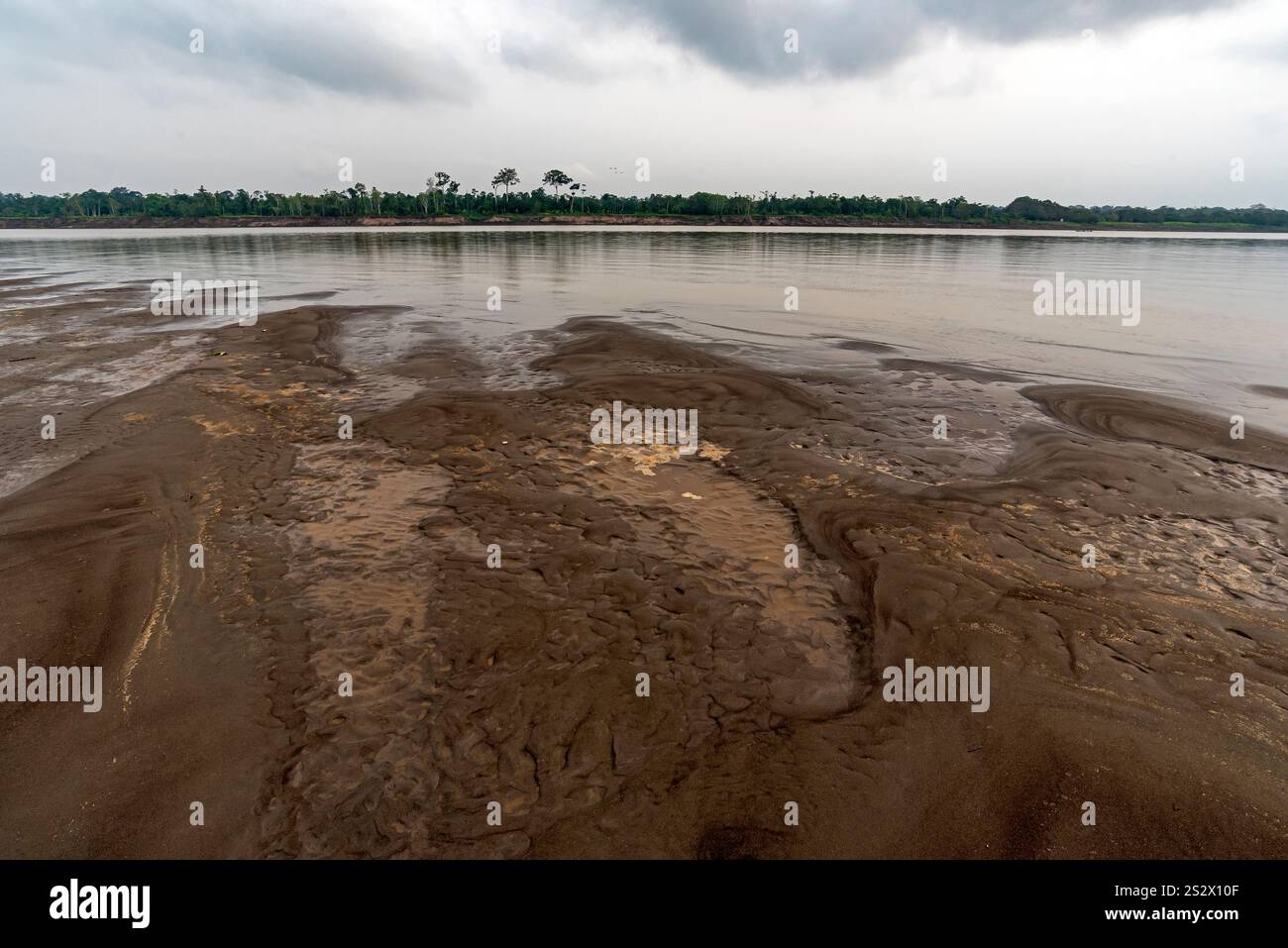 A sand shelf on the middle of the Amazonas River. Puerto Nariño ...