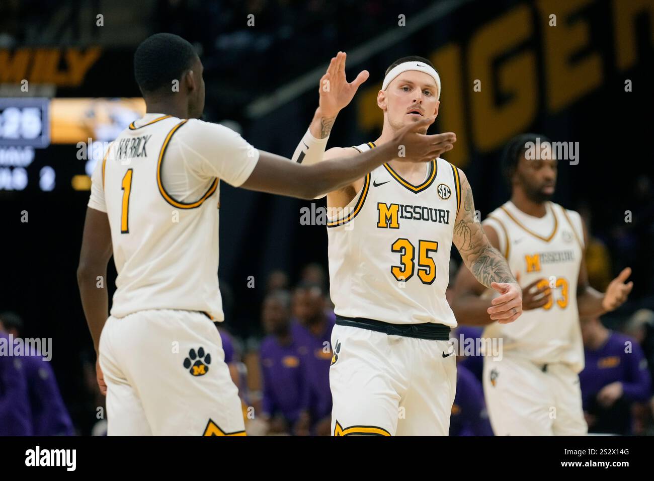 Missouri's Jacob Crews (35) and Marques Warrick (1) celebrate during ...