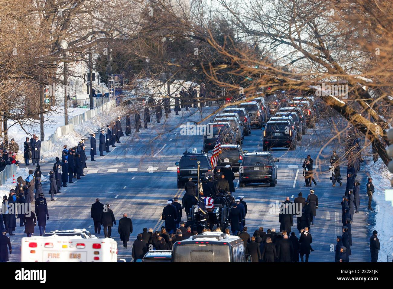 The U.S. Army's Caisson Detachment carries the casket of Jimmy Carter ...