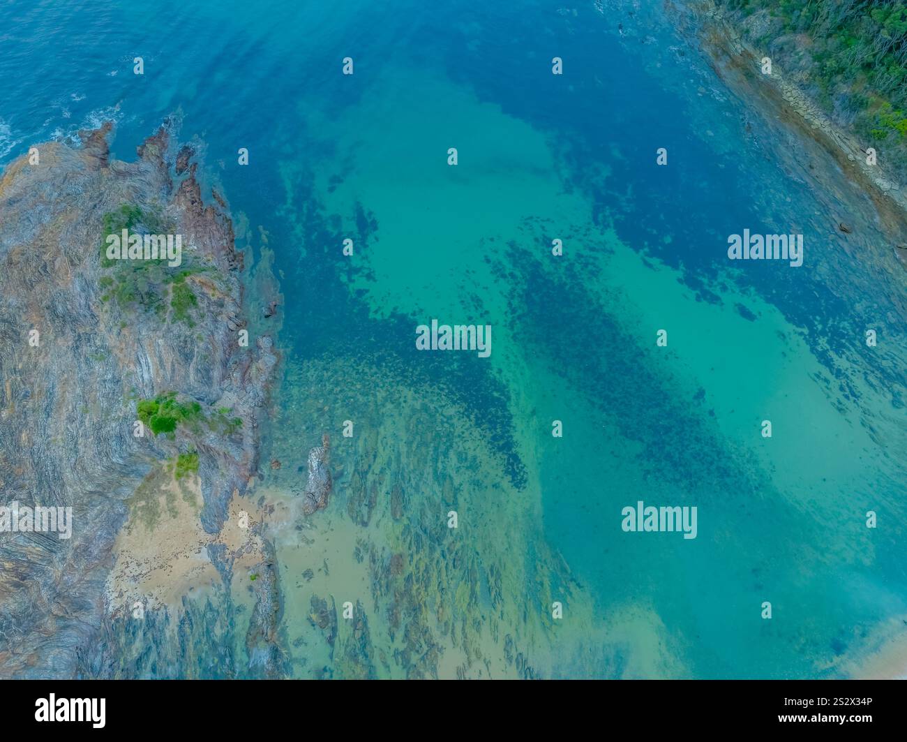 Daytime aerial seascape at Guerilla Bay on the South Coast of NSW ...