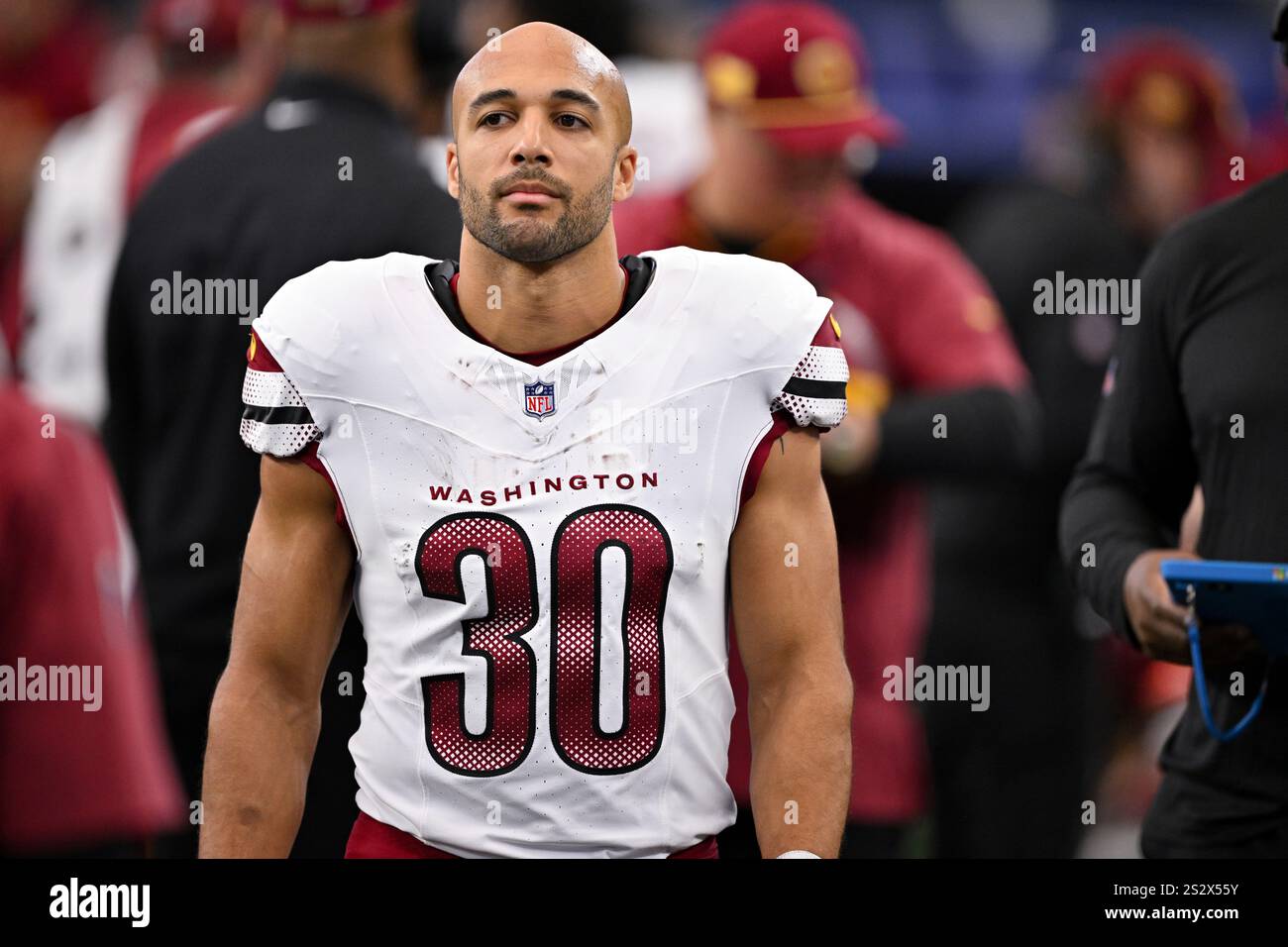 Washington Commanders running back Austin Ekeler (30) looks on from the ...
