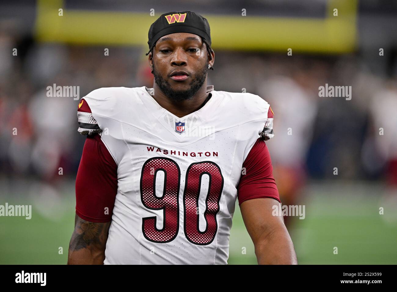 Washington Commanders defensive end Javontae Jean-Baptiste (90) looks ...