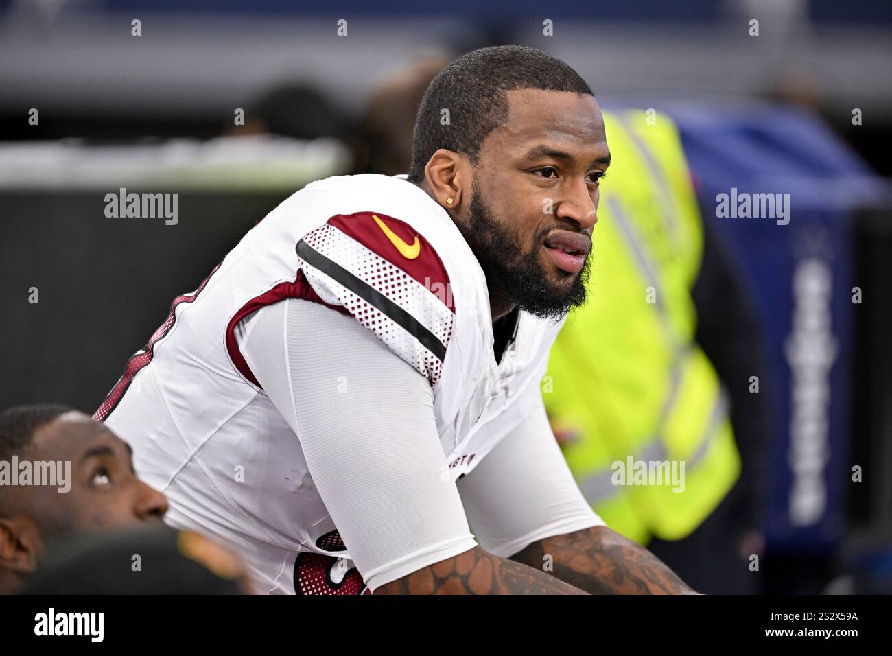 Washington Commanders defensive end Clelin Ferrell (99) looks on from ...