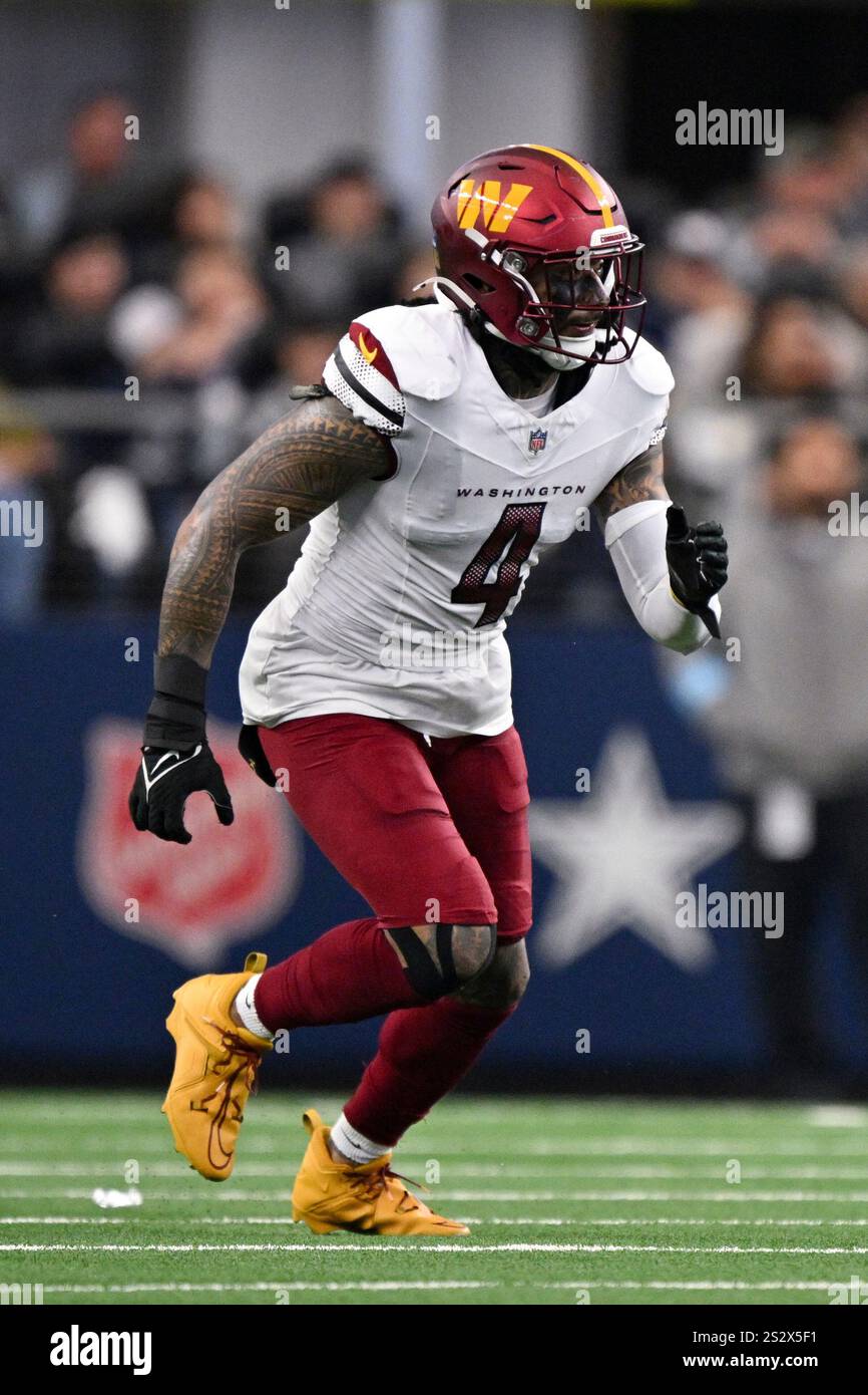 Washington Commanders linebacker Frankie Luvu (4) rushes the line ...