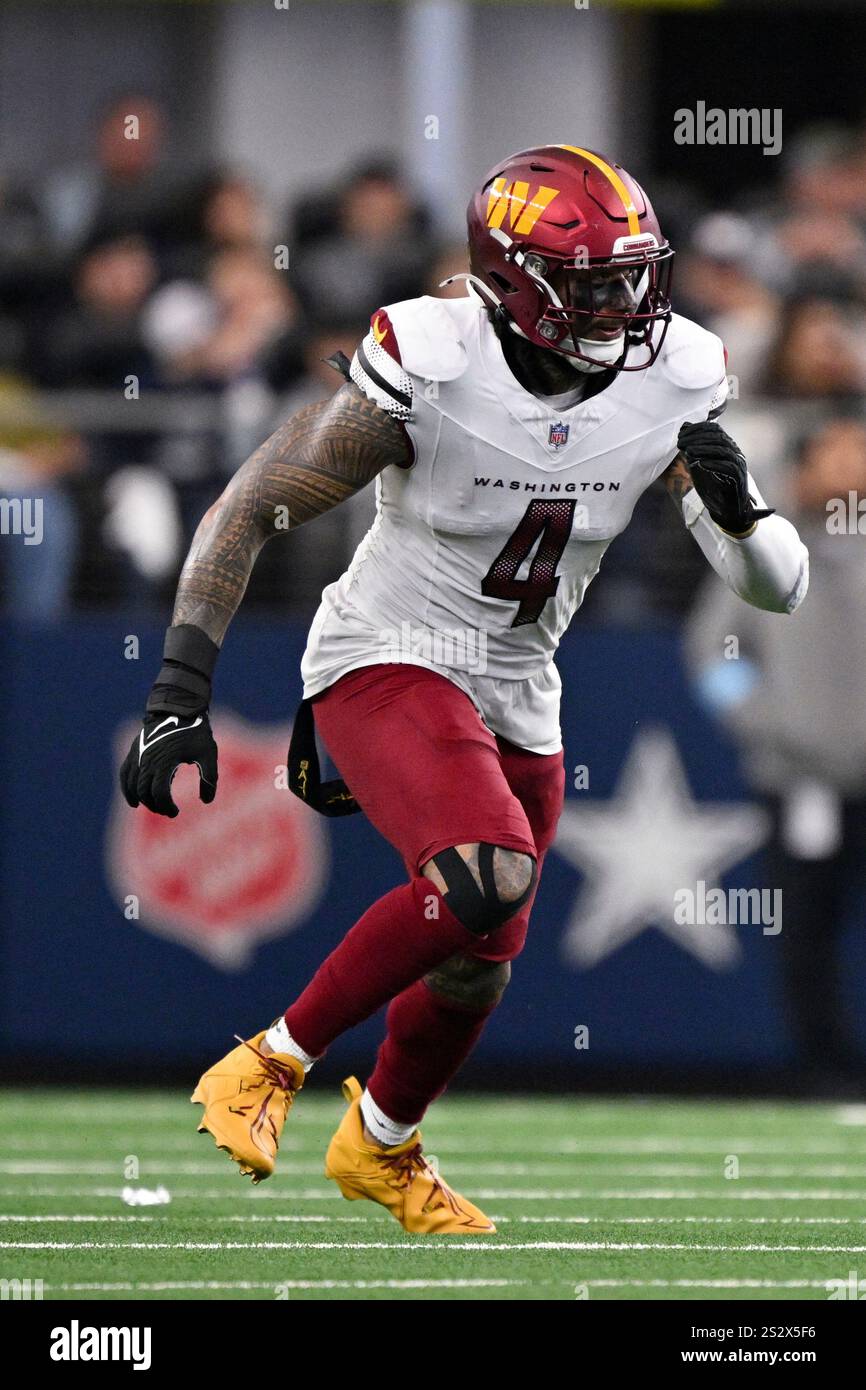 Washington Commanders linebacker Frankie Luvu (4) rushes the line ...
