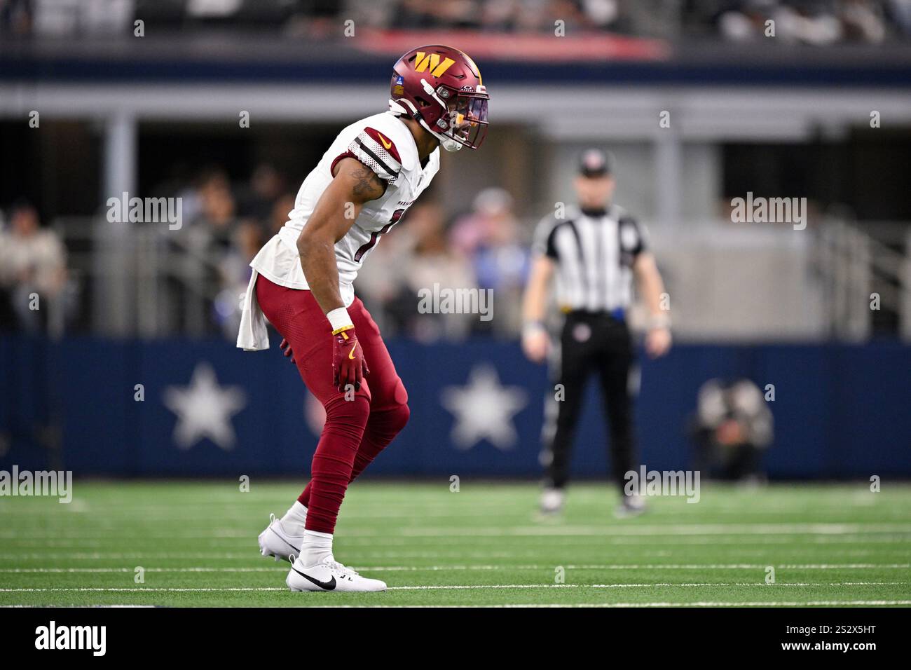 Washington Commanders safety Jeremy Chinn (11) drops into coverage ...