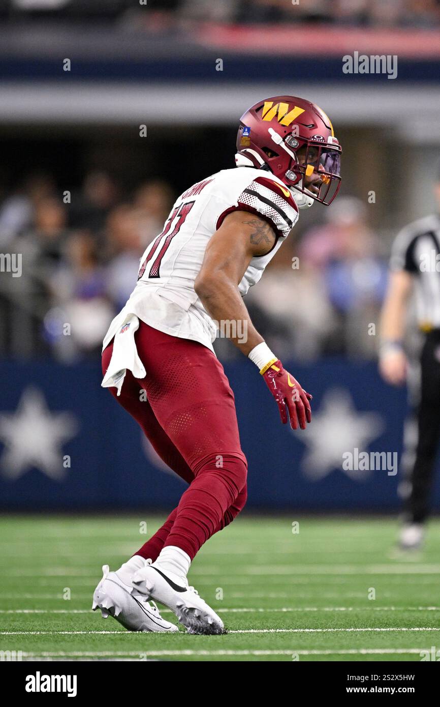 Washington Commanders safety Jeremy Chinn (11) drops into coverage ...