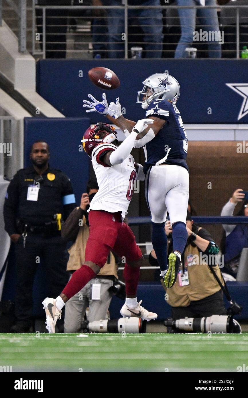 Washington Commanders cornerback Mike Sainristil (0) breaks up a pass ...