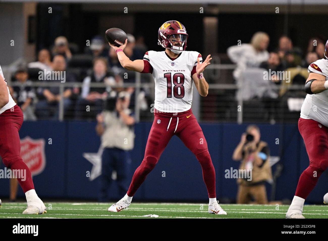 Washington Commanders quarterback Marcus Mariota (18) passes the ball ...