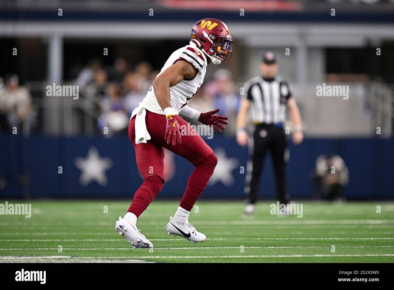 Washington Commanders safety Jeremy Chinn (11) drops into coverage ...