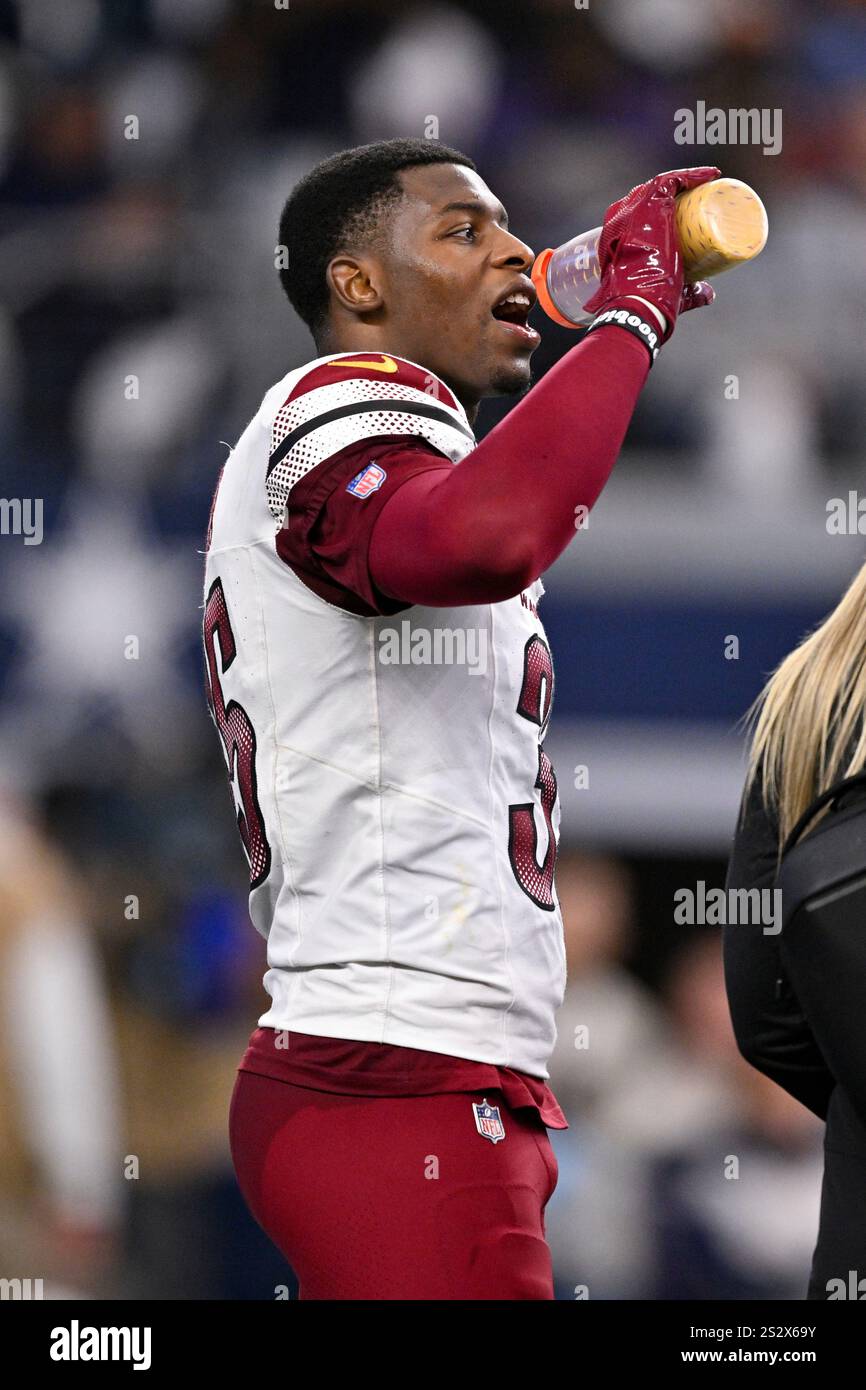 Washington Commanders safety Percy Butler (35) drinks from a water ...