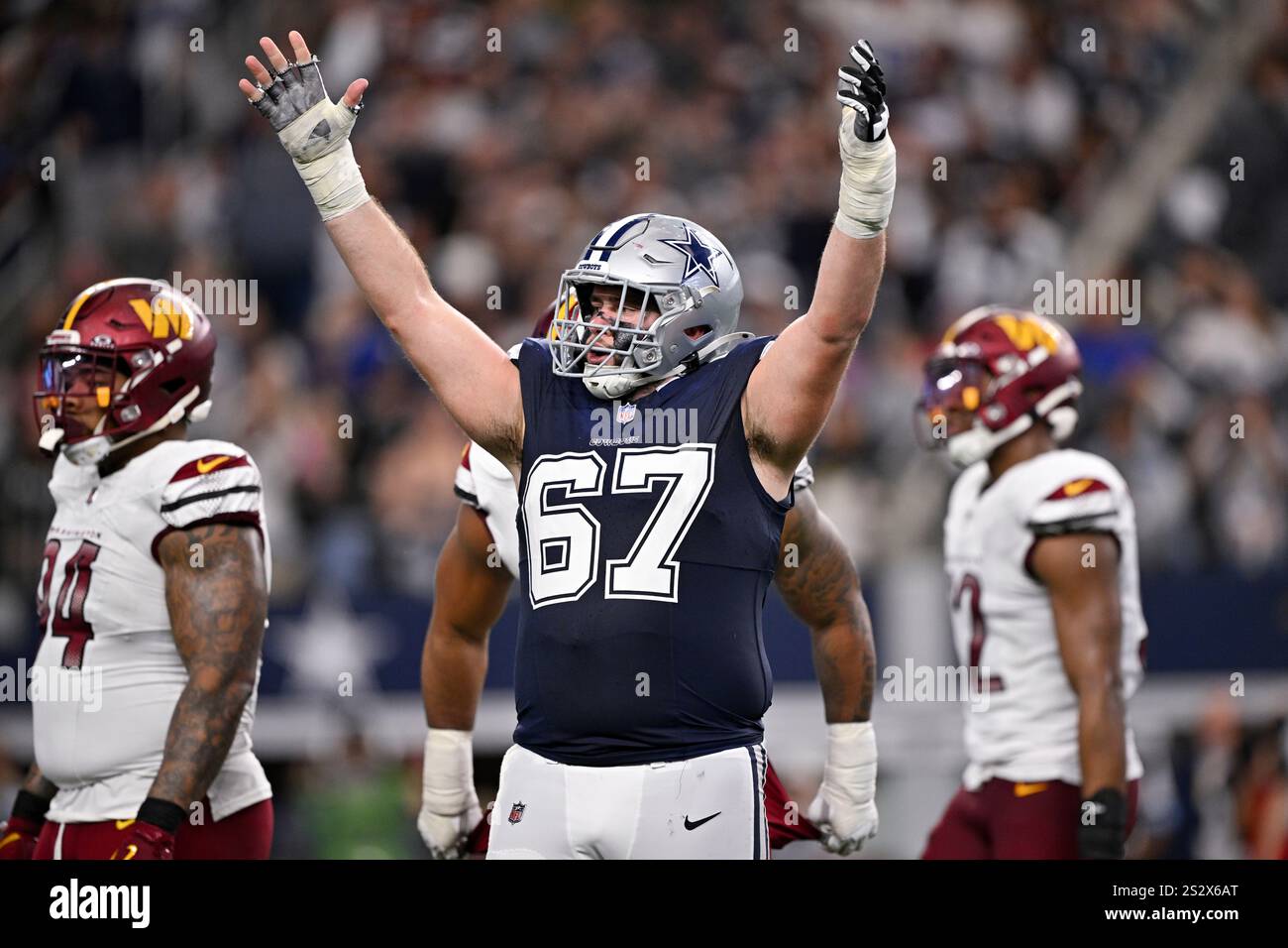 Dallas Cowboys center Brock Hoffman (67) celebrates during an NFL ...