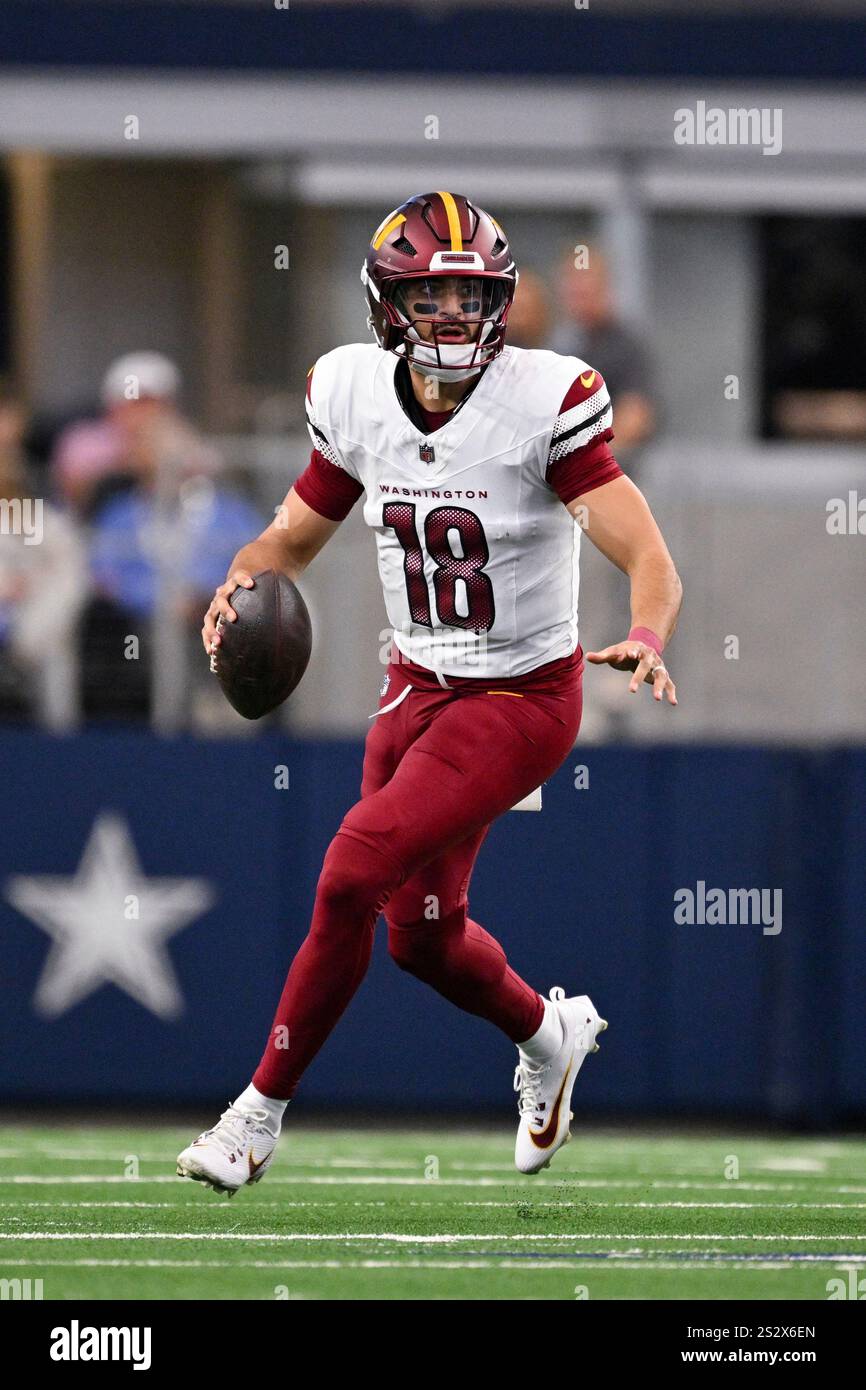 Washington Commanders quarterback Marcus Mariota (18) runs with the ...