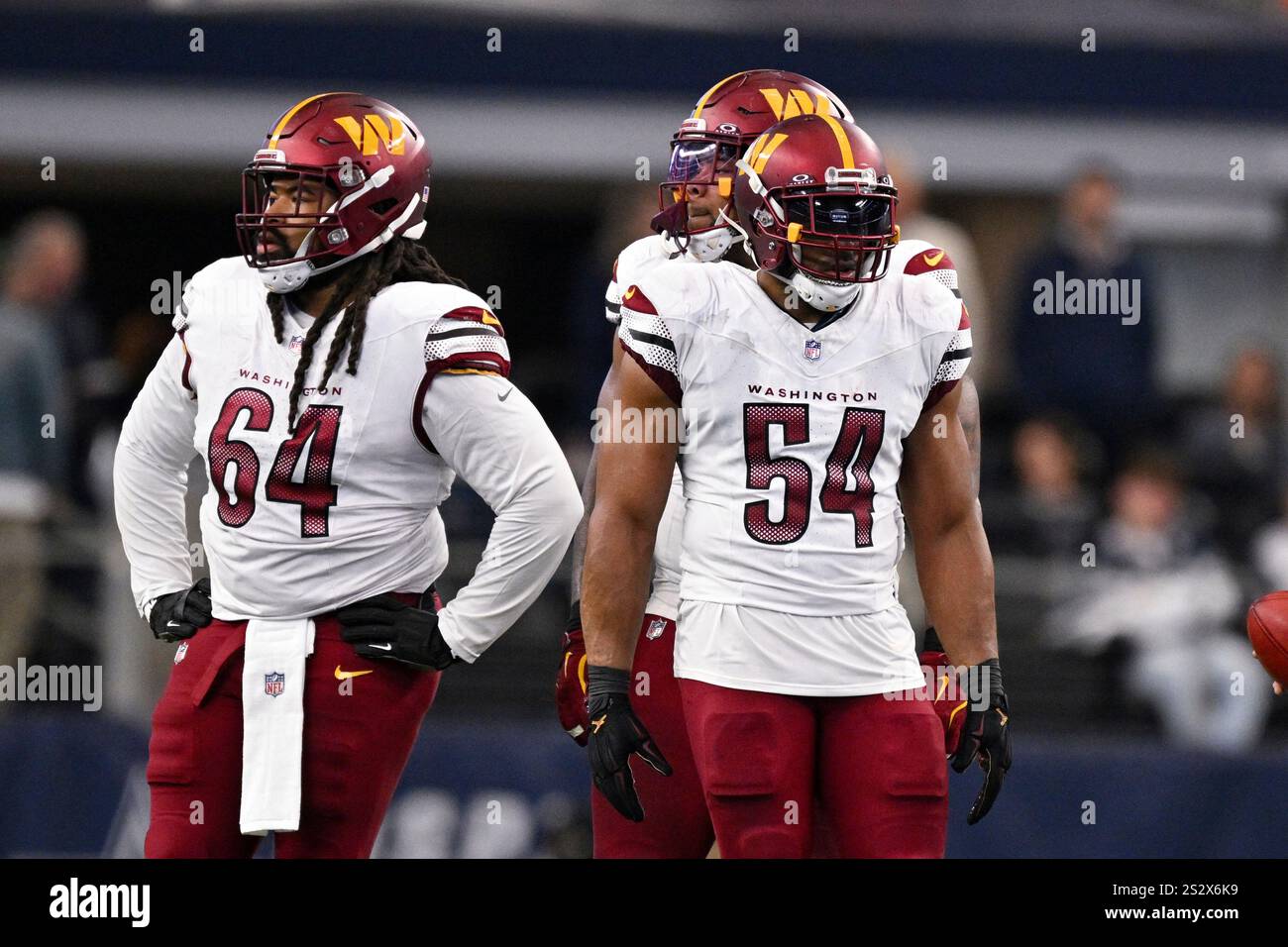 Washington Commanders defensive tackle Sheldon Day (64) and linebacker ...