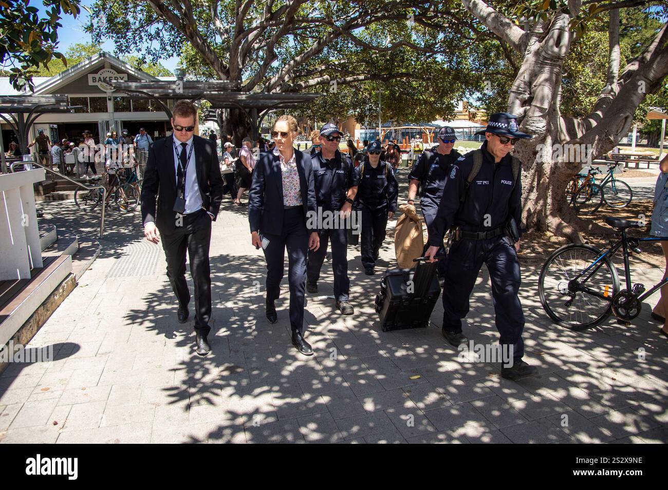 Perth, Australia. 08th Jan, 2025. WA police investigators walk to a ...