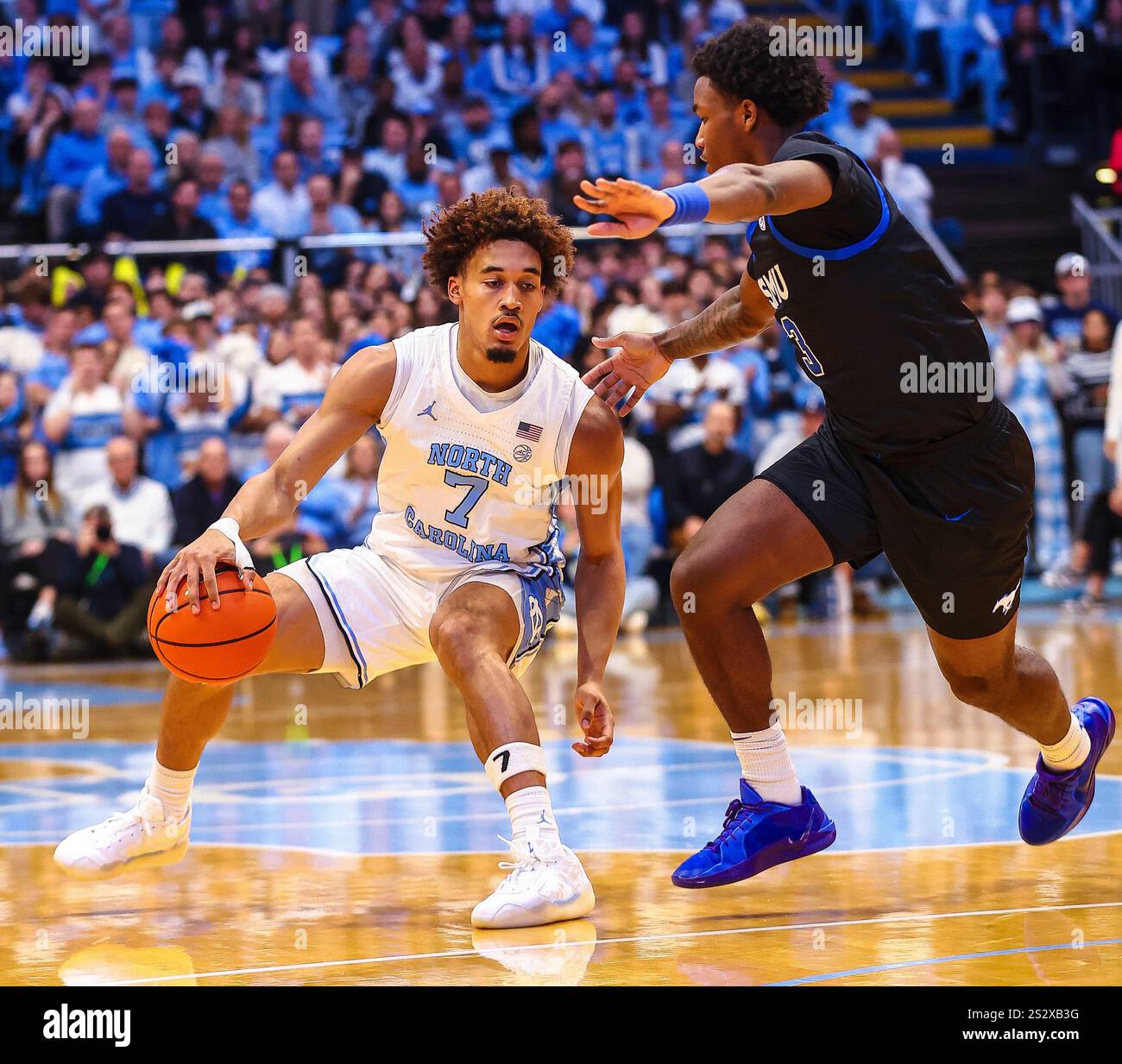 January 7, 2025: North Carolina junior Seth Trimble (7) dribbles ball ...
