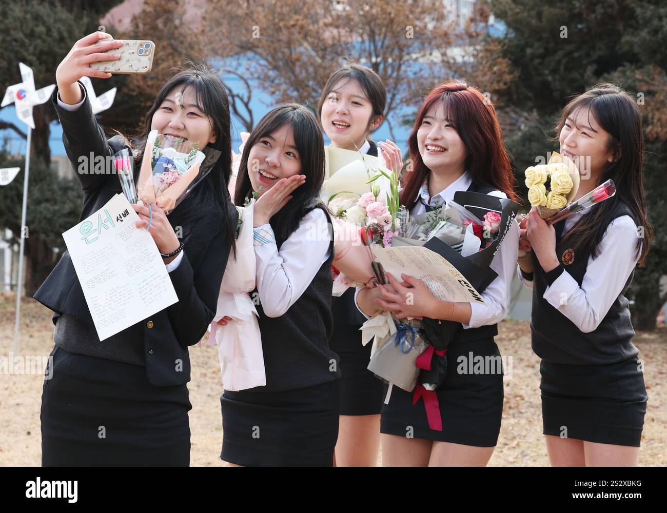 08th Jan, 2025. Graduation Graduates take a selfie during a graduation ...