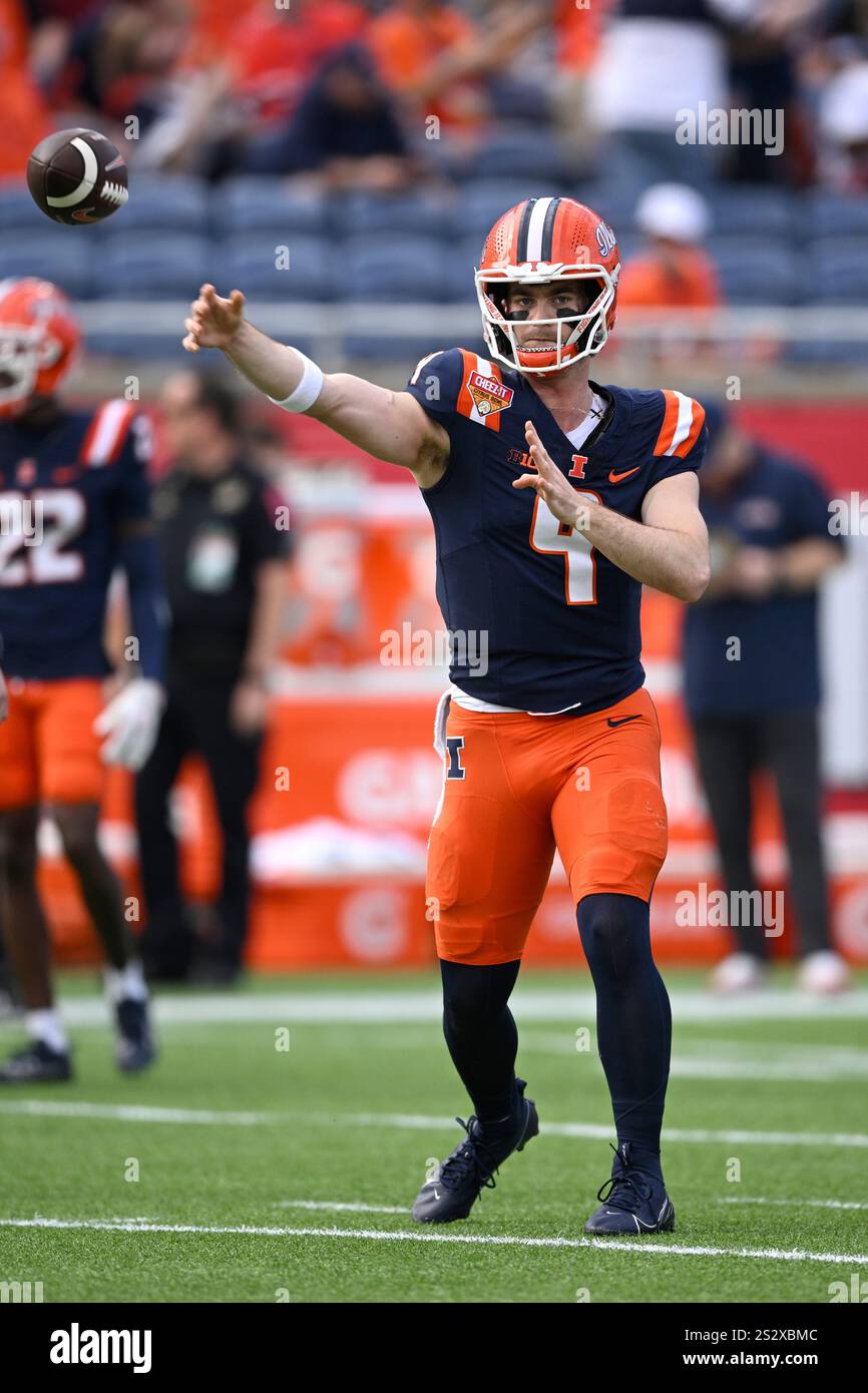 Illinois quarterback Luke Altmyer (9) warms up before the Citrus Bowl ...