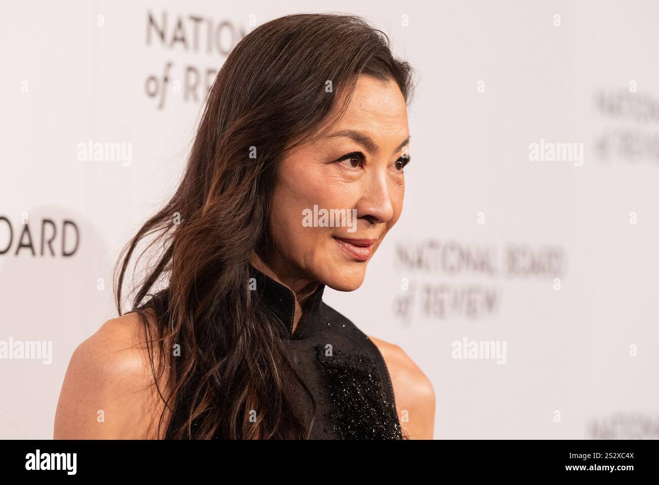 New York, NY, 07 January 2025: Michelle Yeoh wearing dress by Shiatzy ...